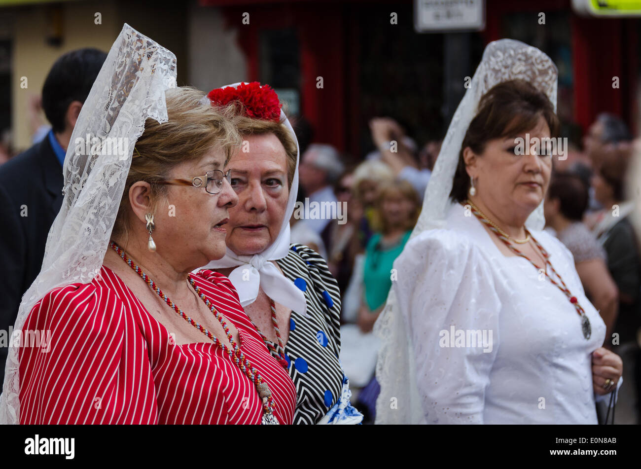 Women in traditional chulapa costumes at the Fiesta de San Isidro ...