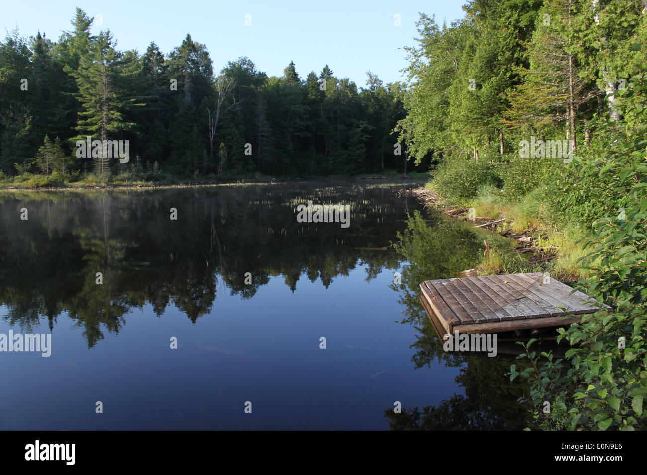 Small lake in cottage country in Quebec, Canada Stock Photo - Alamy