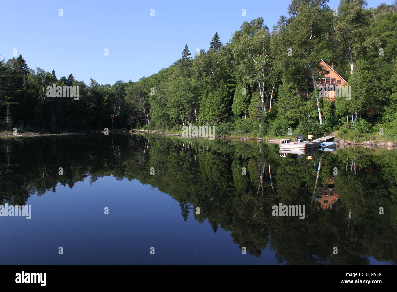 Small lake in cottage country in Quebec, Canada Stock Photo - Alamy