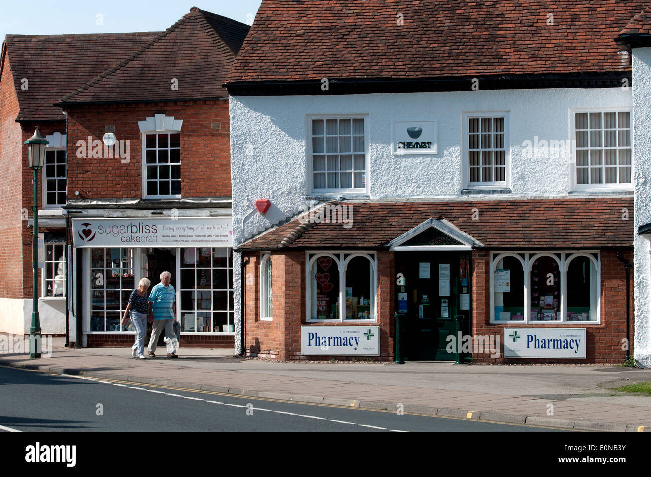 Shops in High Street, Knowle, West Midlands, England, UK Stock Photo ...