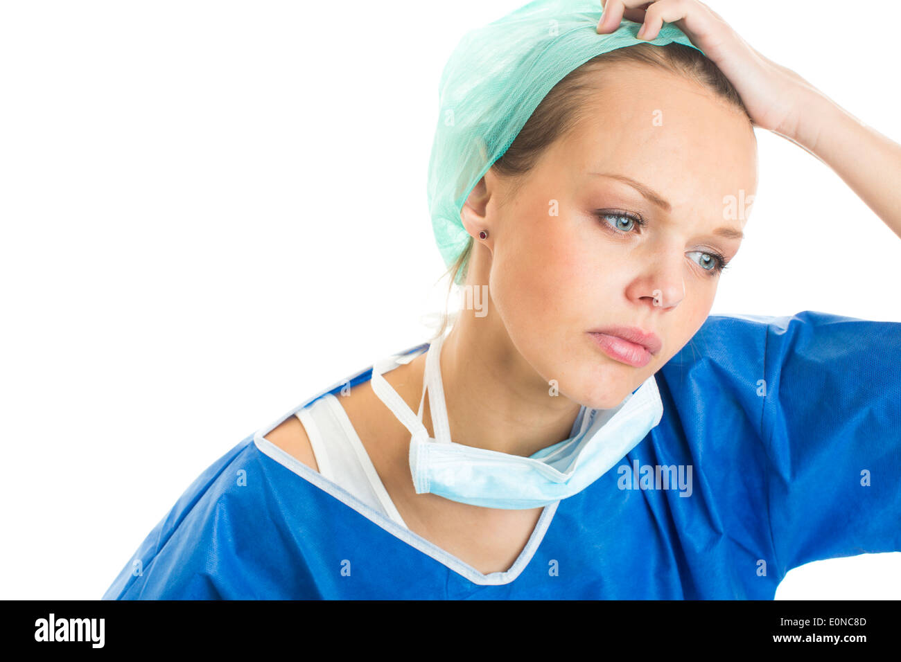 Portrait of a female doctor/surgeon feeling down, exhausted, frustrated ...