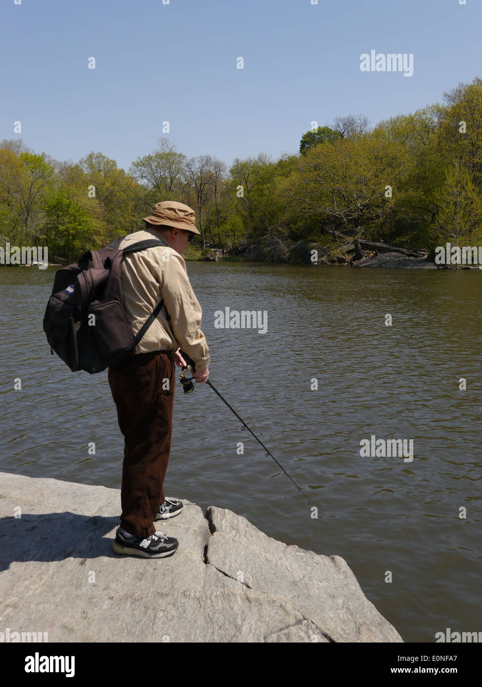 Central Park, New York - man fishing Stock Photo - Alamy
