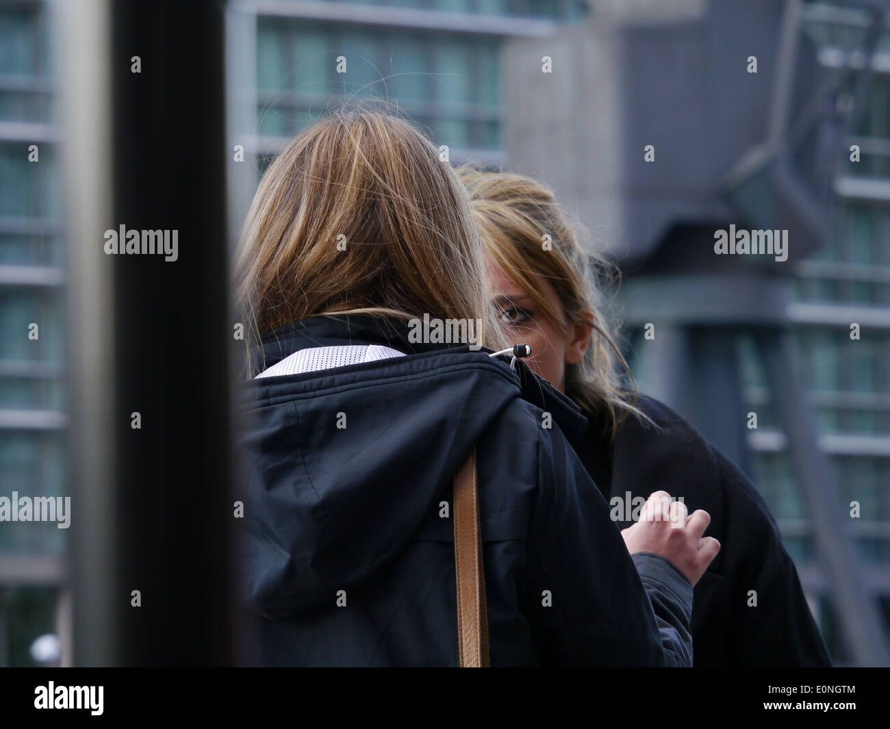 Two women in deep conversation, one looking worried Stock Photo - Alamy