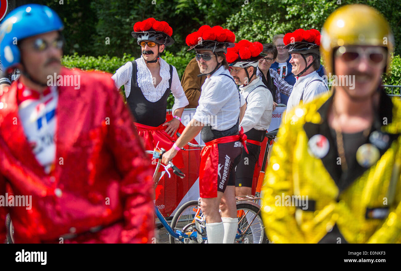 Berlin, Germany. 17th May, 2014. Cyclists wearing costumes prepare to ...