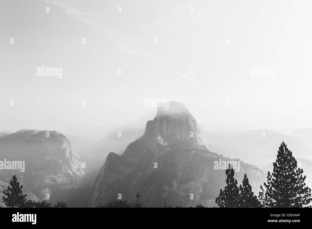 view from Glacier Point in Yosemite on a foggy morning in black and ...