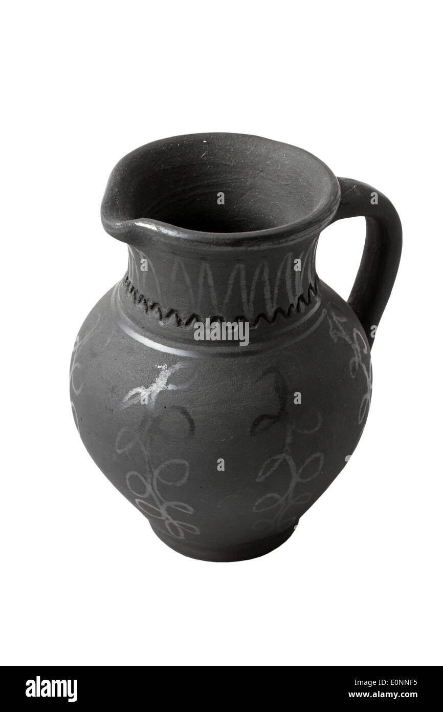 very old black burned clay pot isolated over white background Stock ...