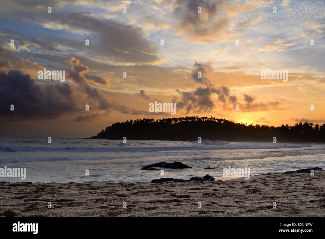 Golden sunset on the tropical desert beach of Mirissa, Southern Sri ...