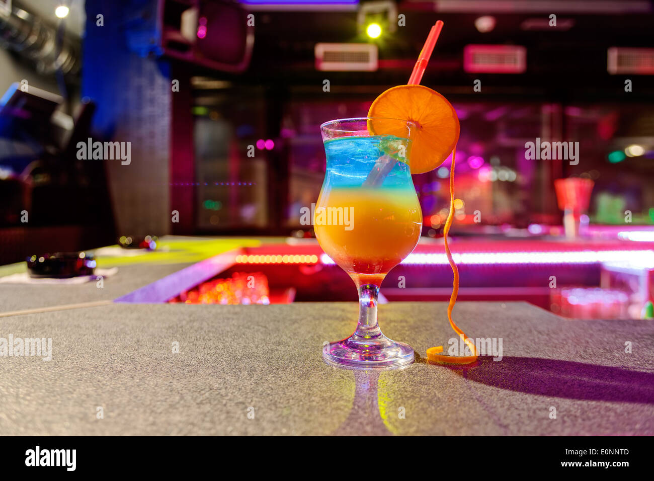 cocktail at bar in a night club with vivid colors Stock Photo - Alamy