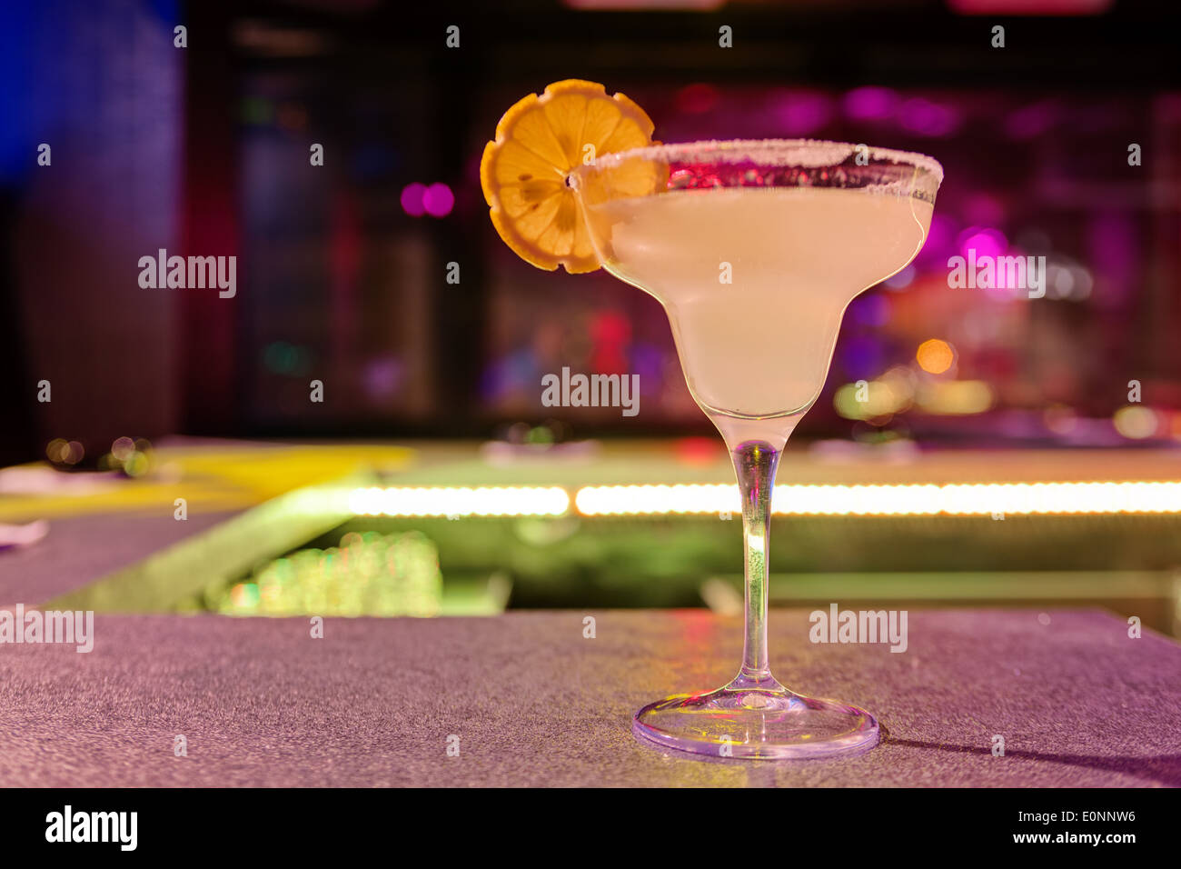 cocktail at bar in a night club with vivid colors Stock Photo - Alamy
