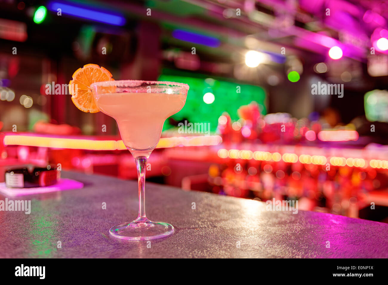 cocktail at bar in a night club with vivid colors Stock Photo - Alamy