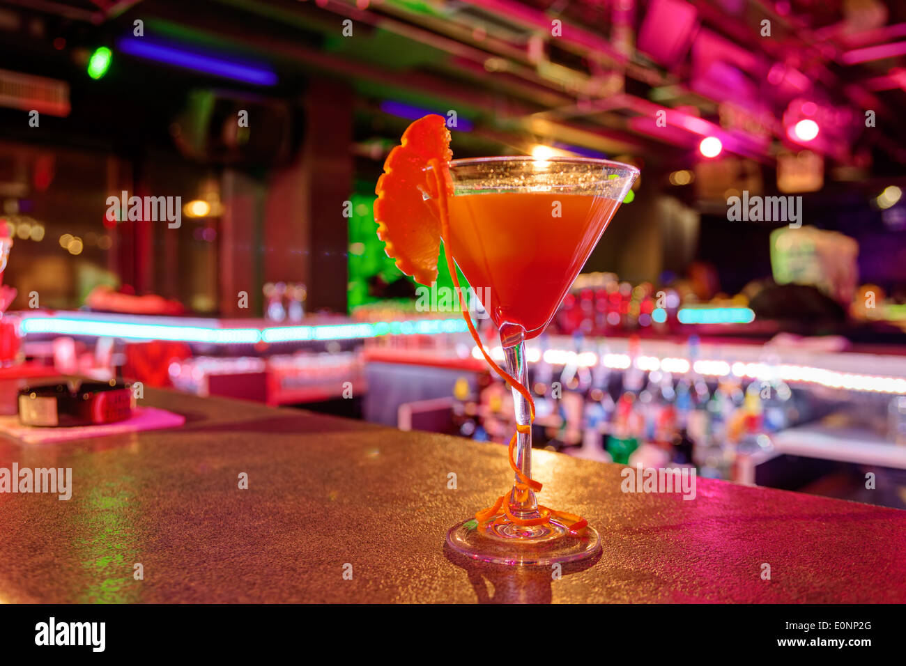 cocktail at bar in a night club with vivid colors Stock Photo - Alamy
