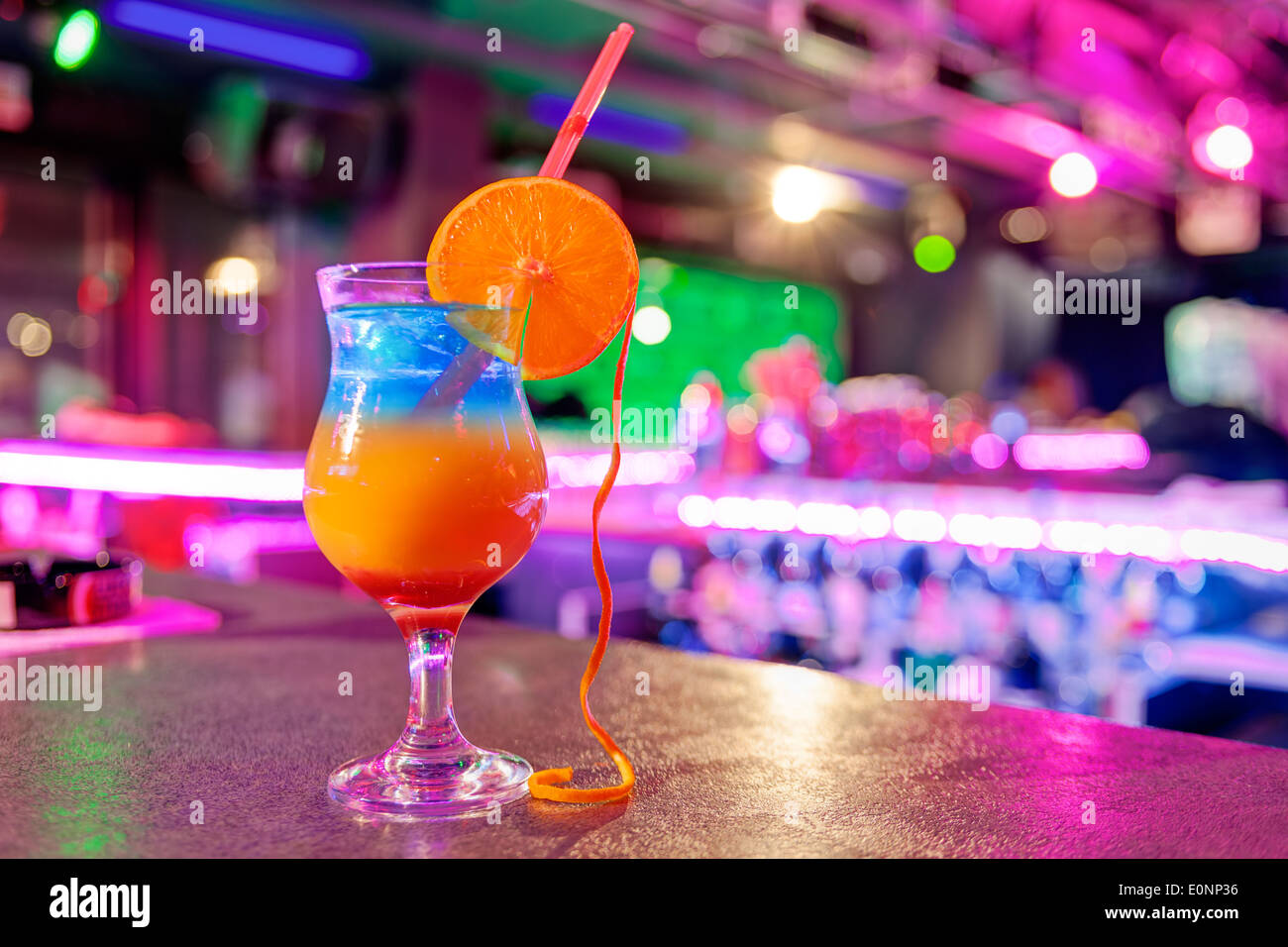 cocktail at bar in a night club with vivid colors Stock Photo - Alamy