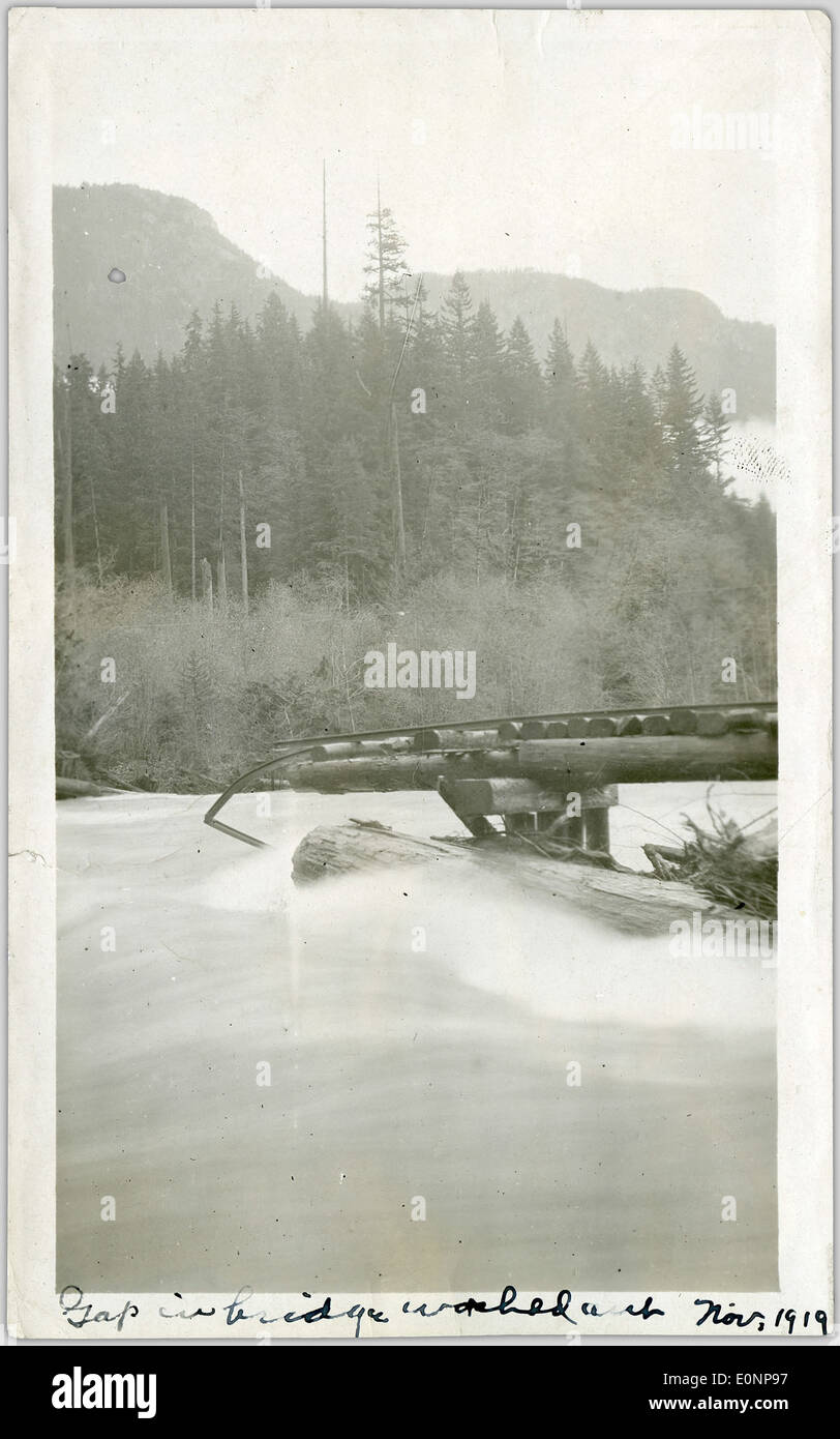 A photograph documenting a bridge gap caused by flooding or structural ...