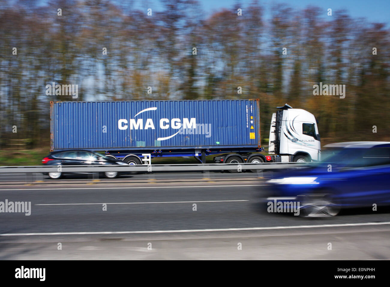 A shipping container being hauled along the A12 dual carriageway and ...