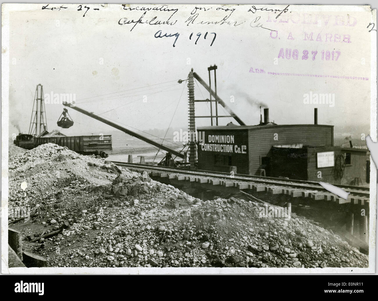 This image depicts excavation work on Lot 27 for a log dump, capturing ...