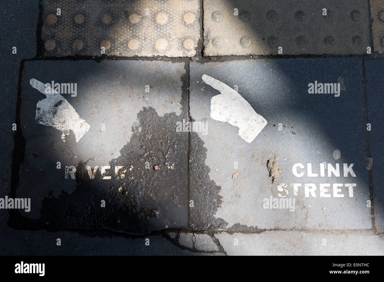 Tiled directions to Clink Street embedded into the pavement of ...