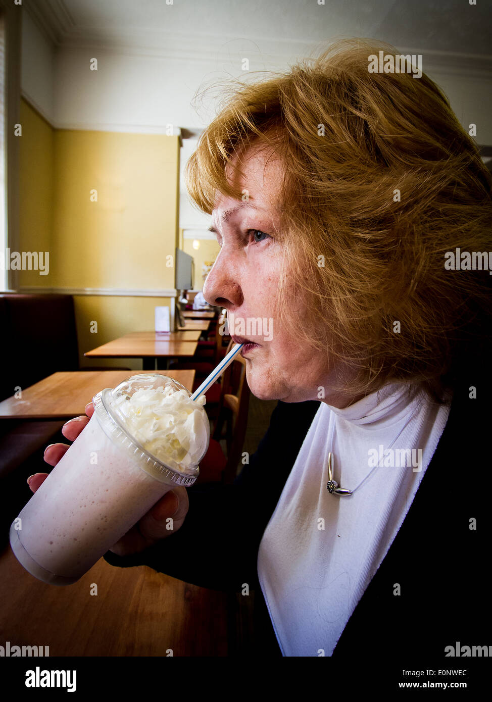 Woman drinking face cream hi-res stock photography and images - Alamy