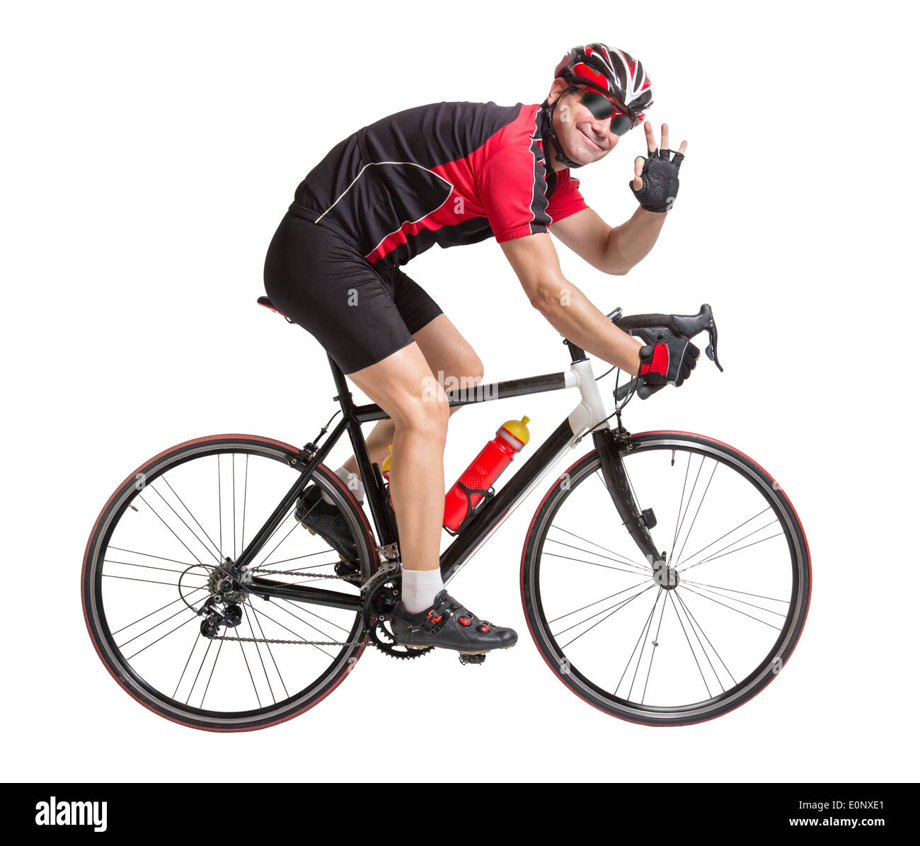 cheerful cyclist with winning gesture riding a bike isolated on white ...