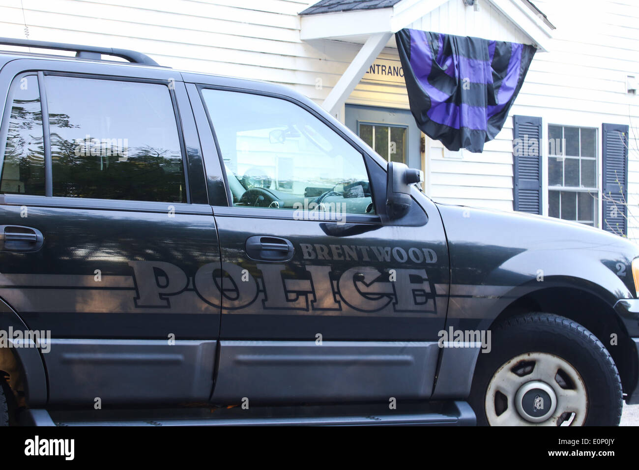 Brentwood, New Hampshire, USA. 17th May, 2014. Black and Blue banners ...