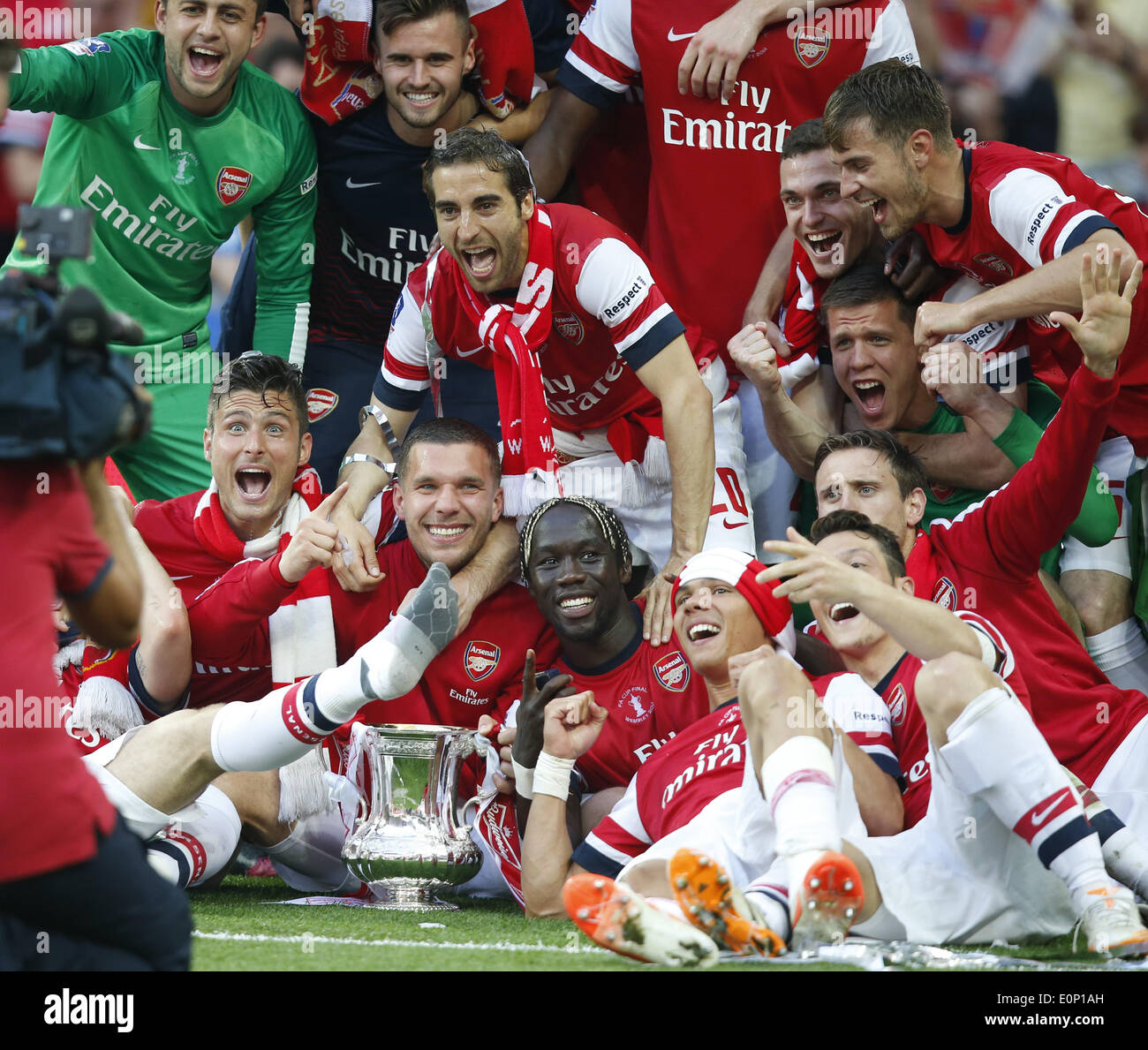 London, Britain. 17th May, 2014. Players of Arsenal celebrate with the ...