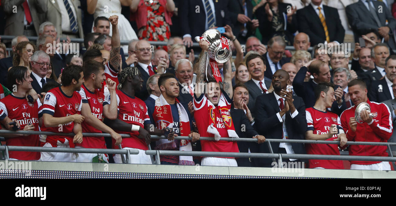 London, Britain. 17th May, 2014. Jack Wilshere of Arsenal lifts the ...
