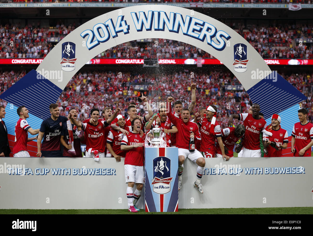 London, Britain. 17th May, 2014. Players of Arsenal celebrate with the ...
