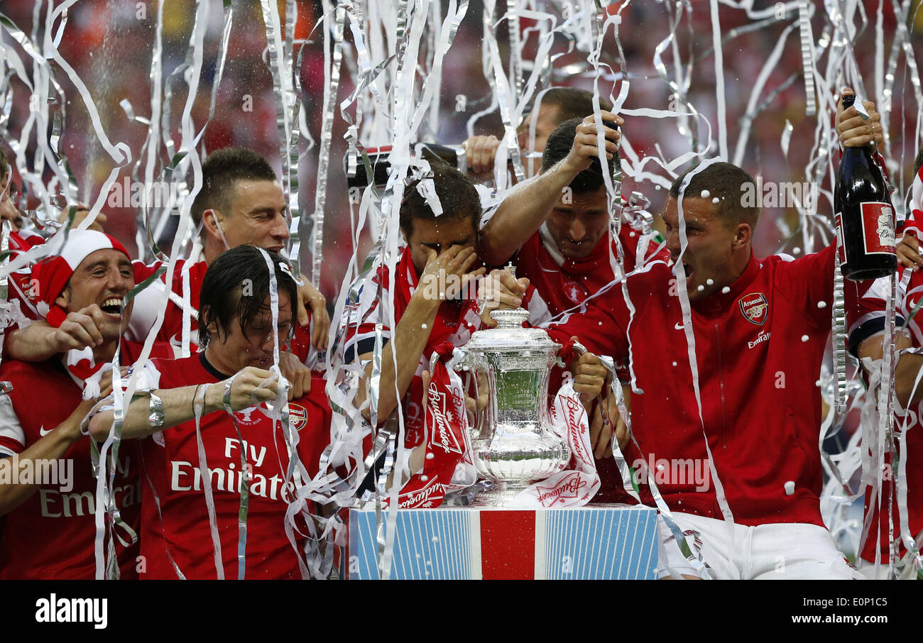 London, Britain. 17th May, 2014. Players of Arsenal celebrate with the ...