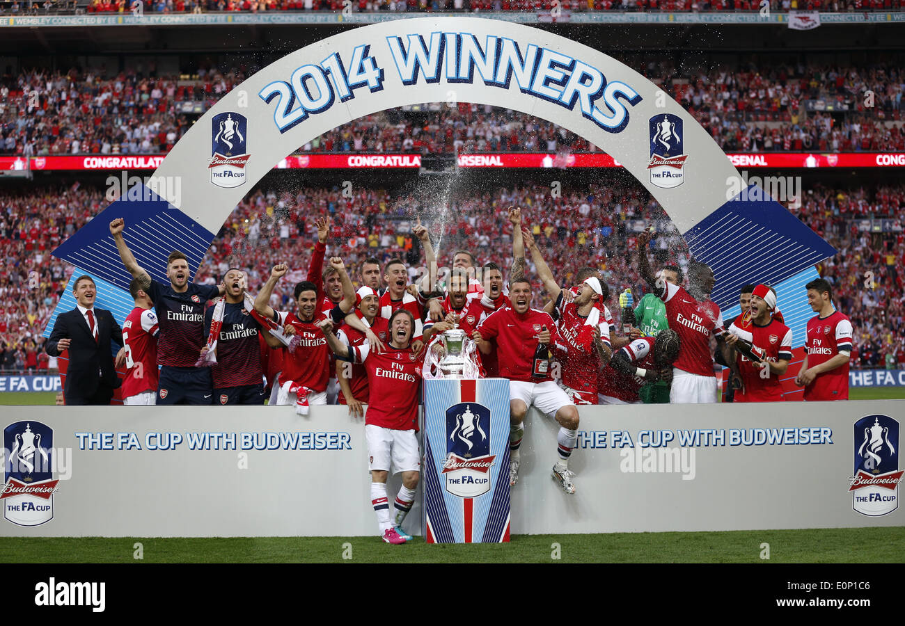 London, Britain. 17th May, 2014. Players of Arsenal celebrate with the ...