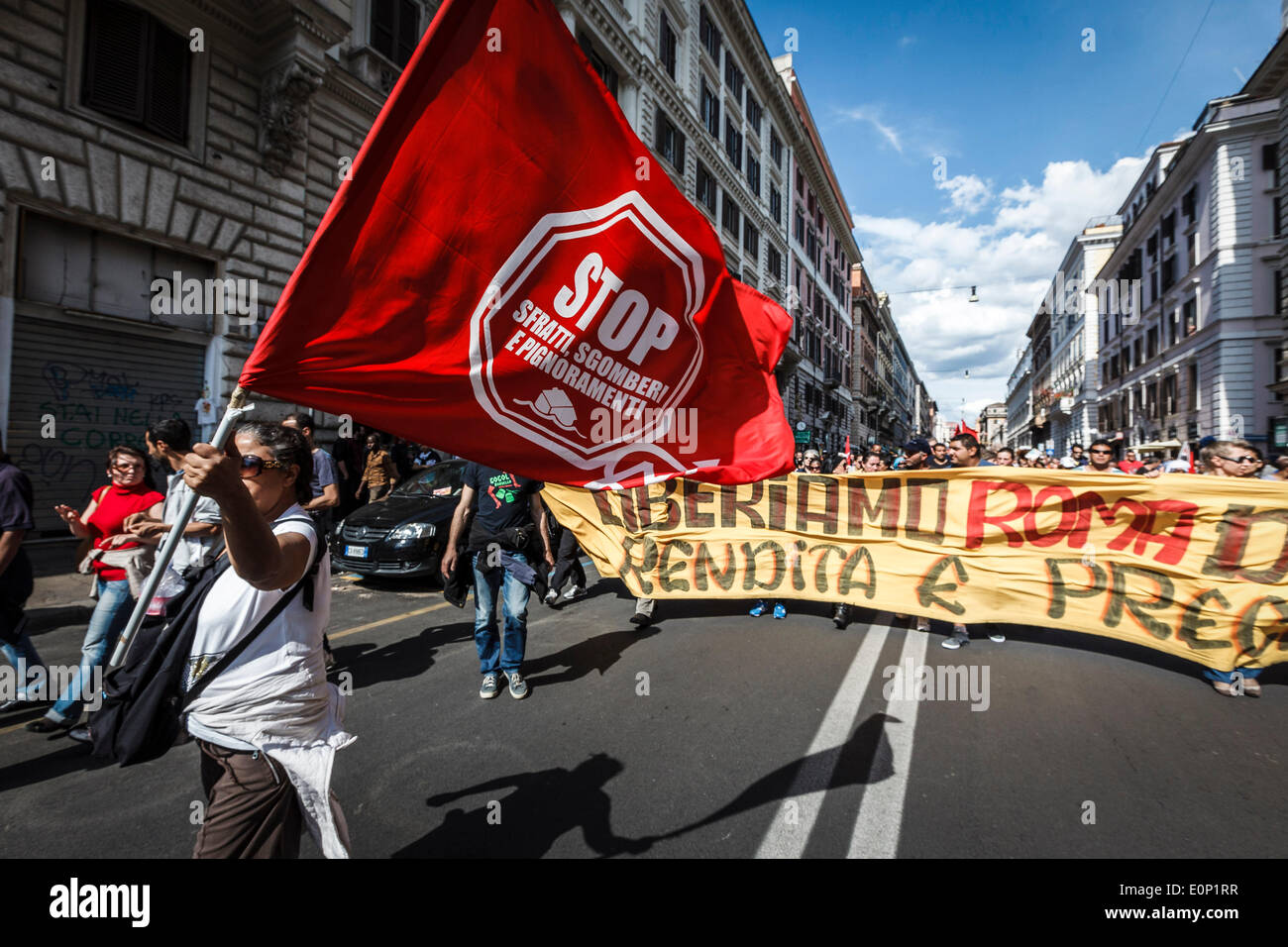 Rome, Italy. 17th May, 2014. Protesters wave flags and hold banners ...