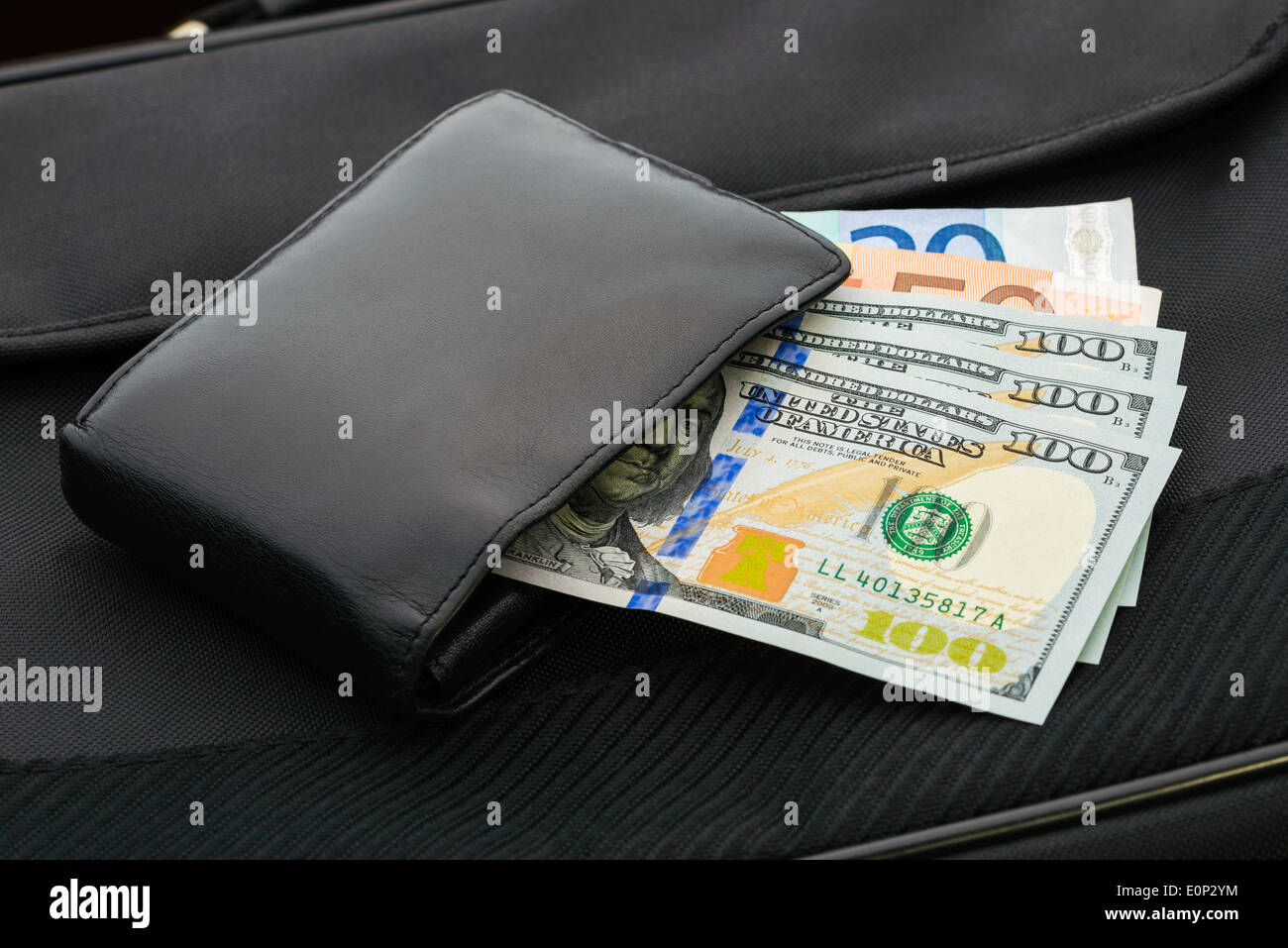 Black wallet euro coins hi-res stock photography and images - Alamy