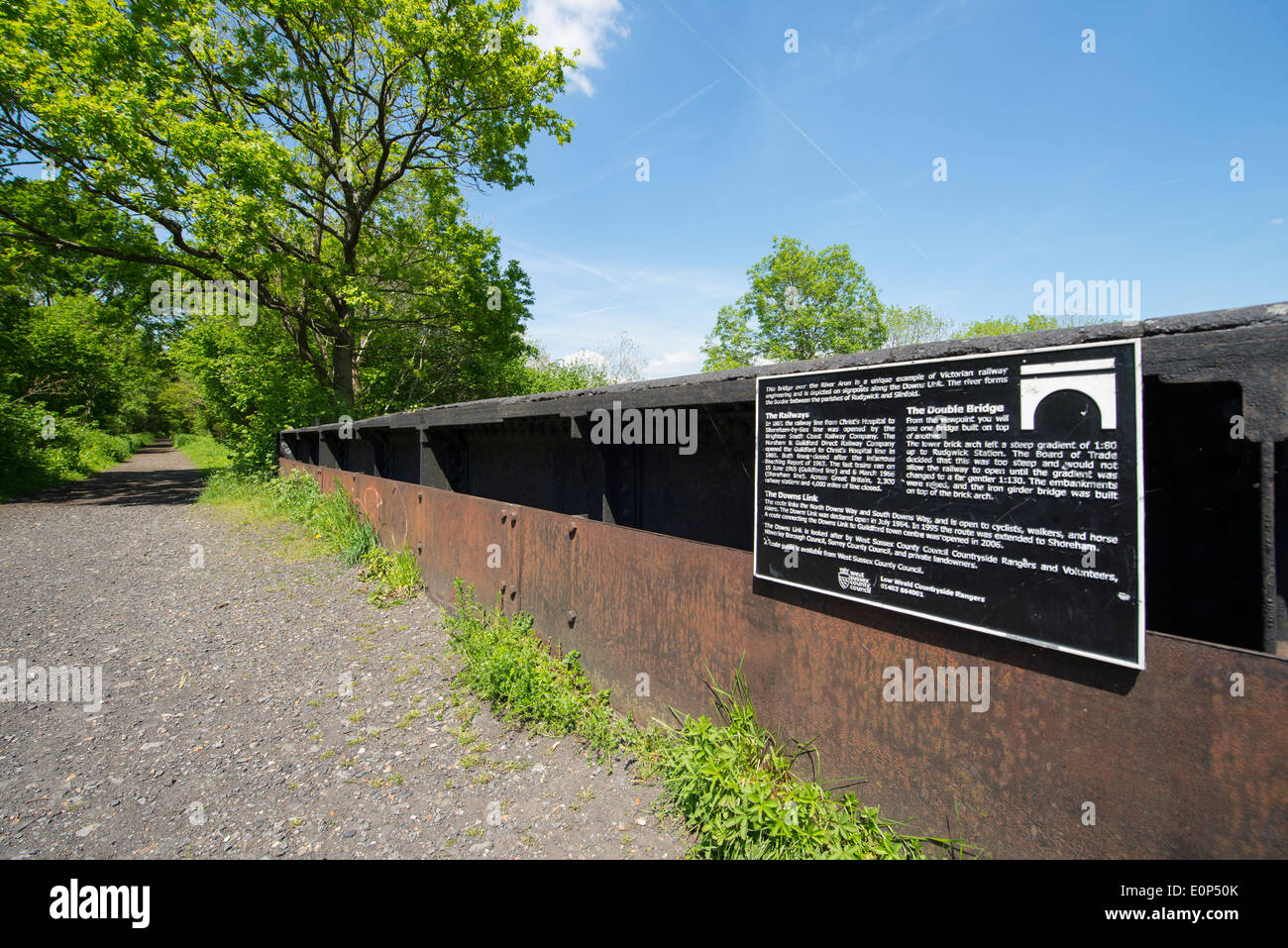Rudgwick, West Sussex UK, the Downs Link Path crossing disused two tier ...