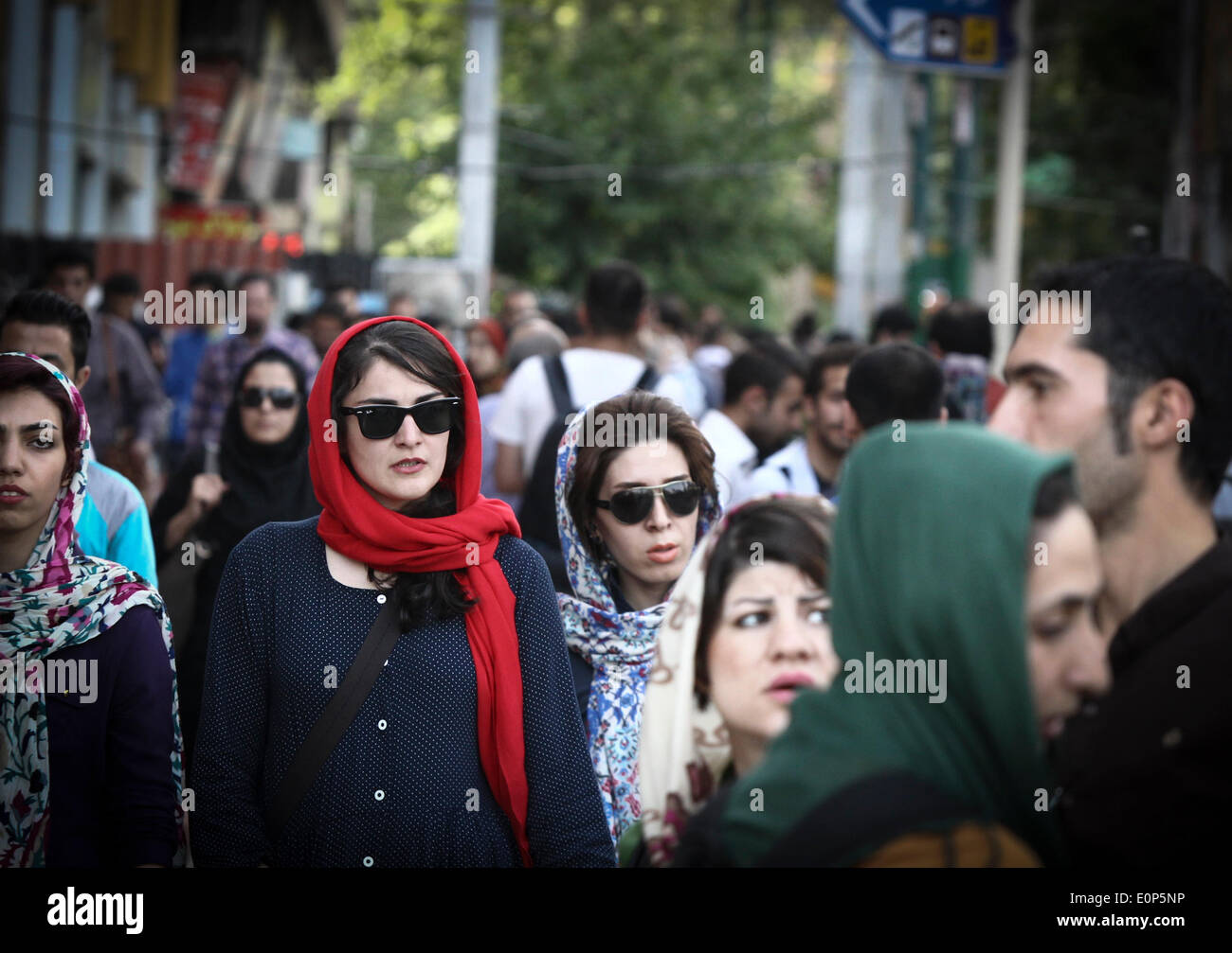 Tehran, Iran. 17th May, 2014. Iranian women walk on a street in ...