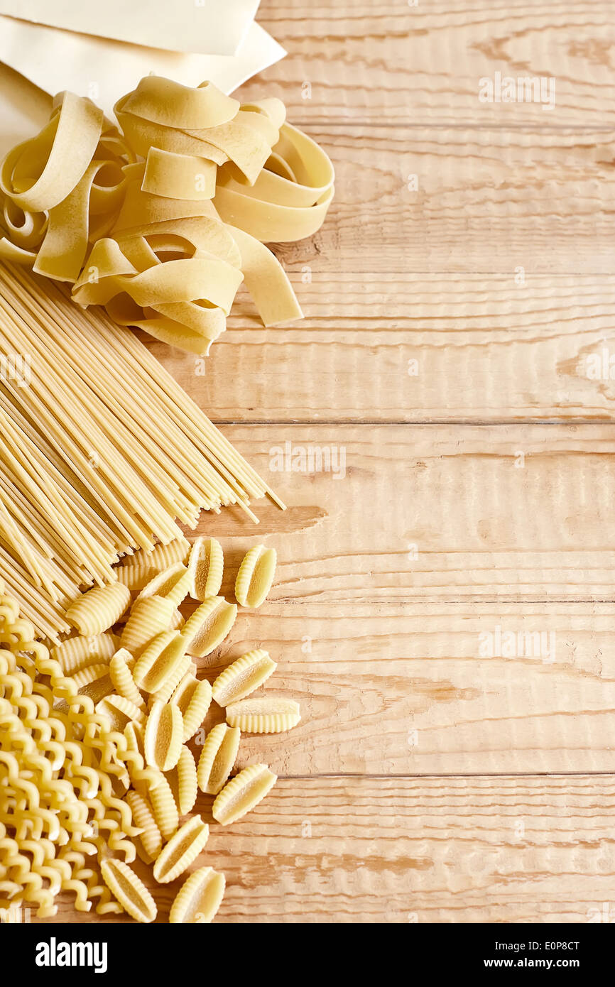 Mix of dry pasta. Copy space background Stock Photo - Alamy