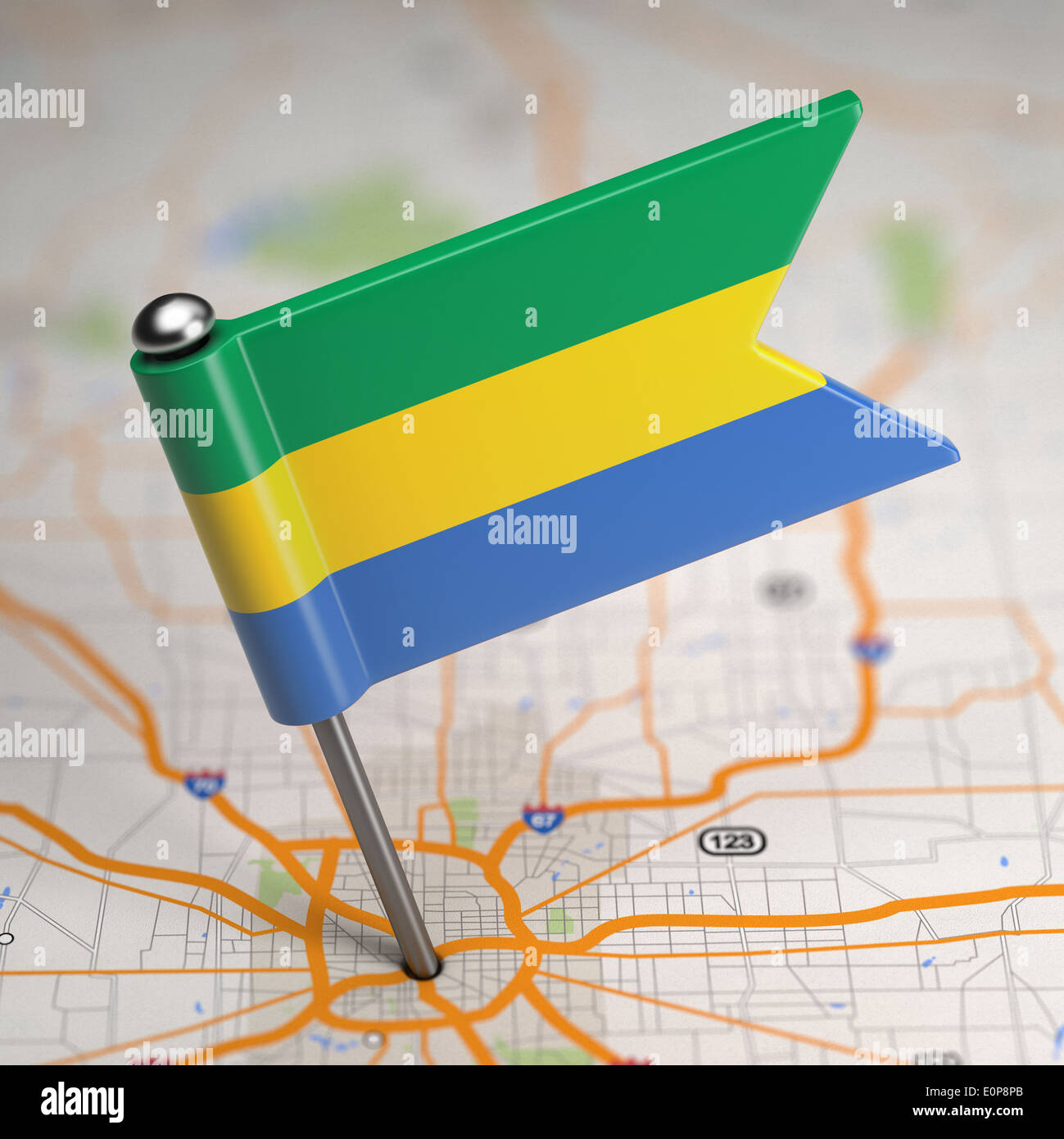 Small Flag Gabonese Republic on a Map Background with Selective Focus ...