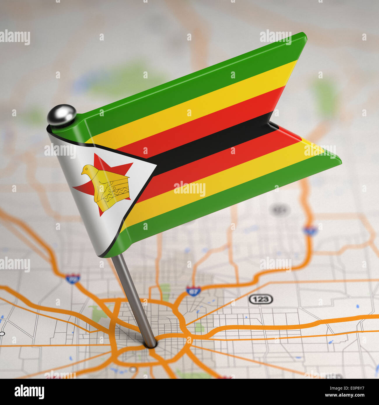 Small Flag Republic of Zimbabwe on a Map Background with Selective ...