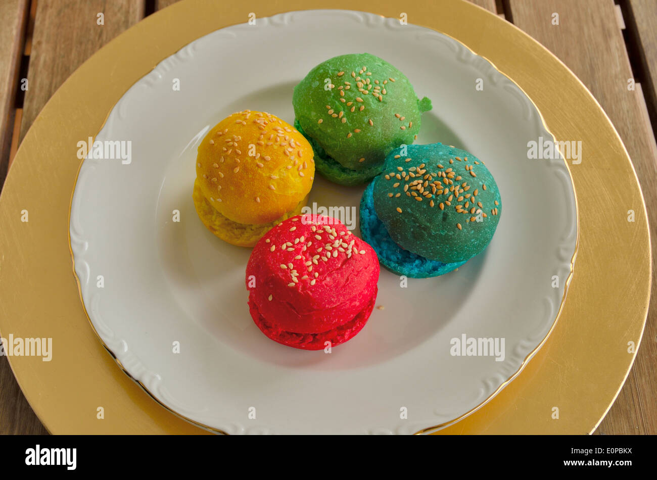 Mini burgers with buns colors Stock Photo - Alamy