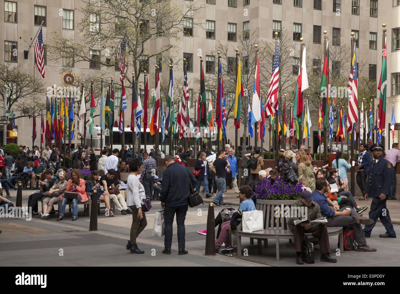 International flags at Rockefeller Center speak to the crowds from ...