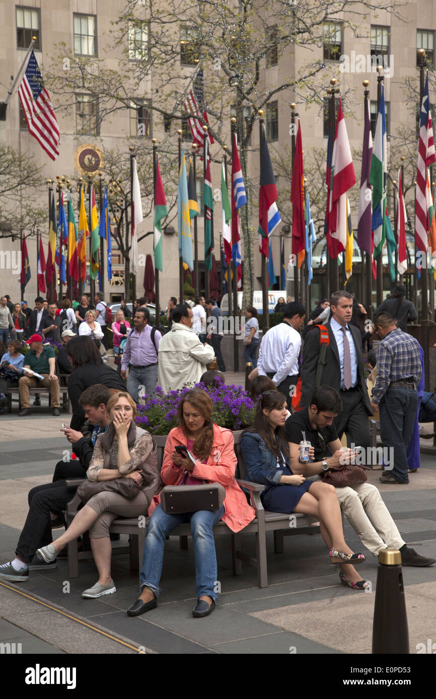 International flags at Rockefeller Center speak to the crowds from ...