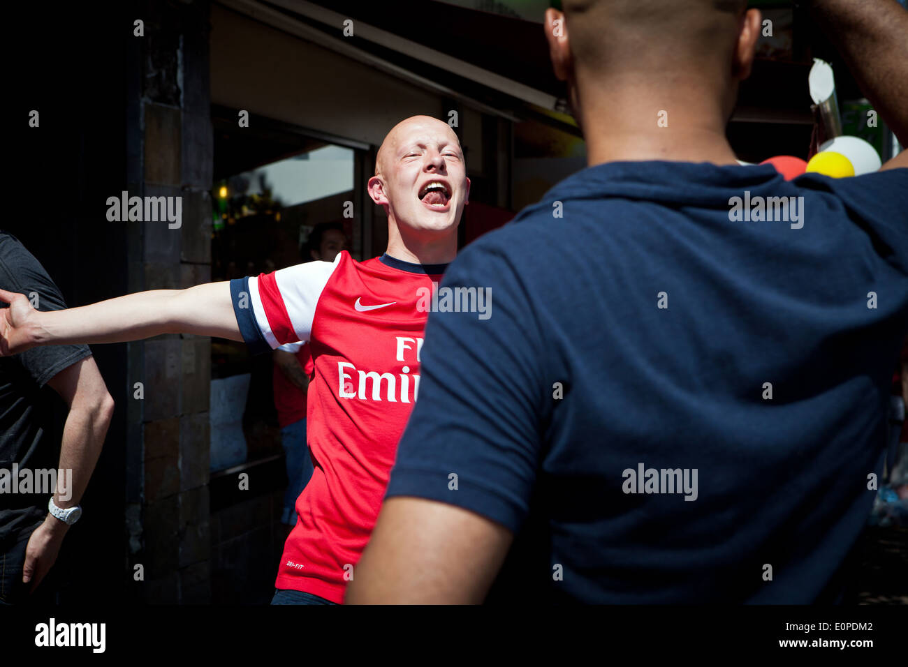 Arsenal fans singing hi-res stock photography and images - Alamy
