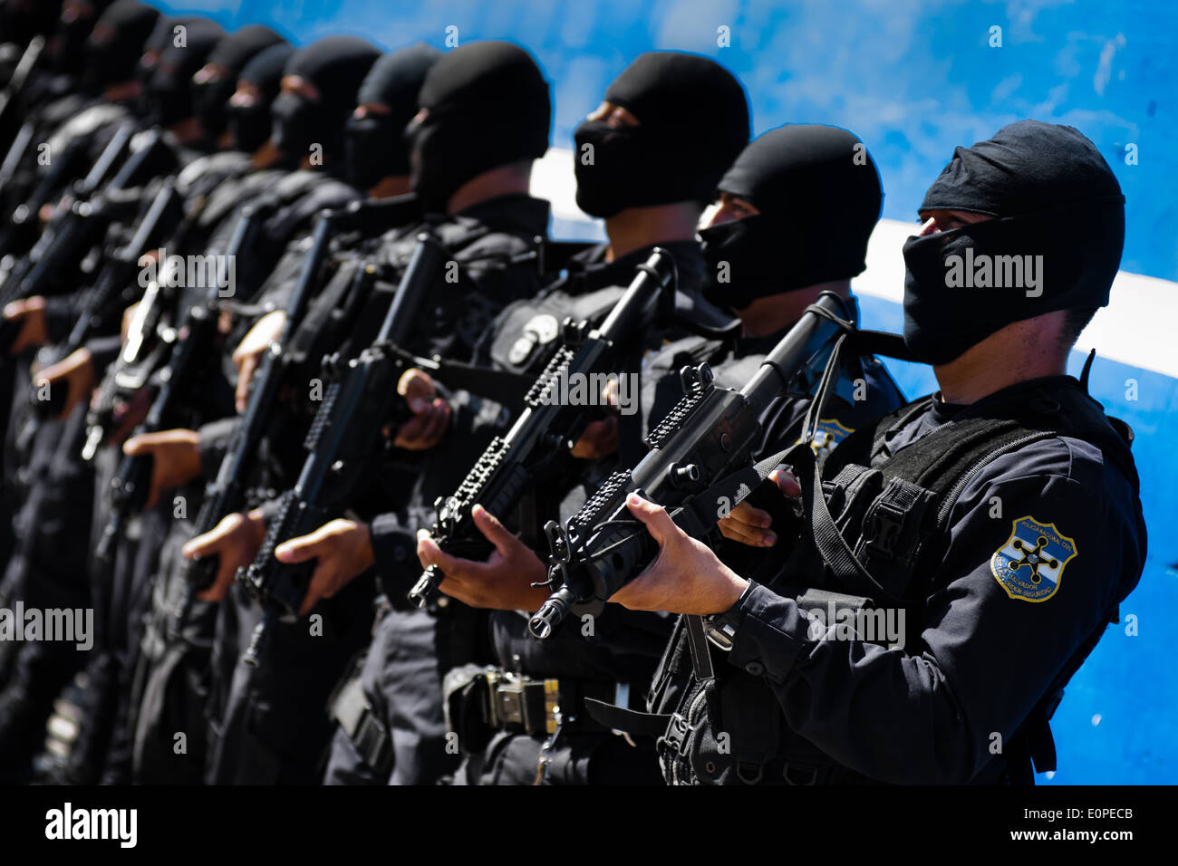Members of the specialized Police anti-gang unit pose for pictures ...