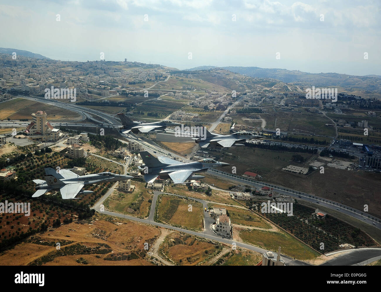 US and Royal Jordanian Air Force F-16 Fighting Falcons and a US Marine ...
