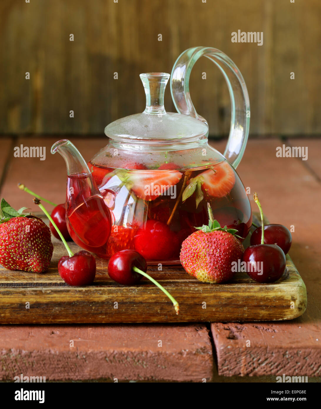 summer fruit tea with a variety of berries (cherry, strawberry Stock ...