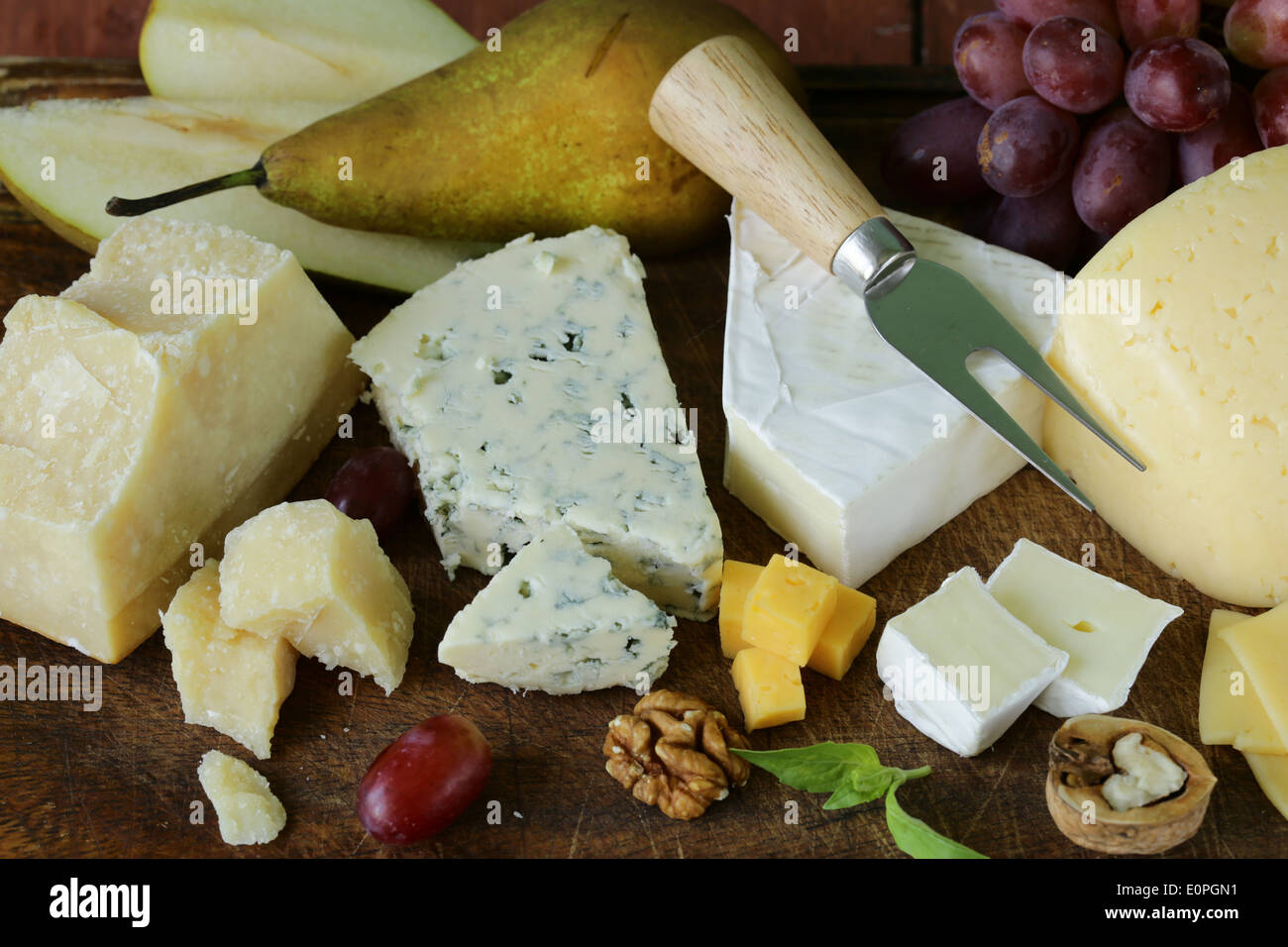 cheeseboard with assorted cheeses (parmesan, brie, blue, cheddar Stock ...