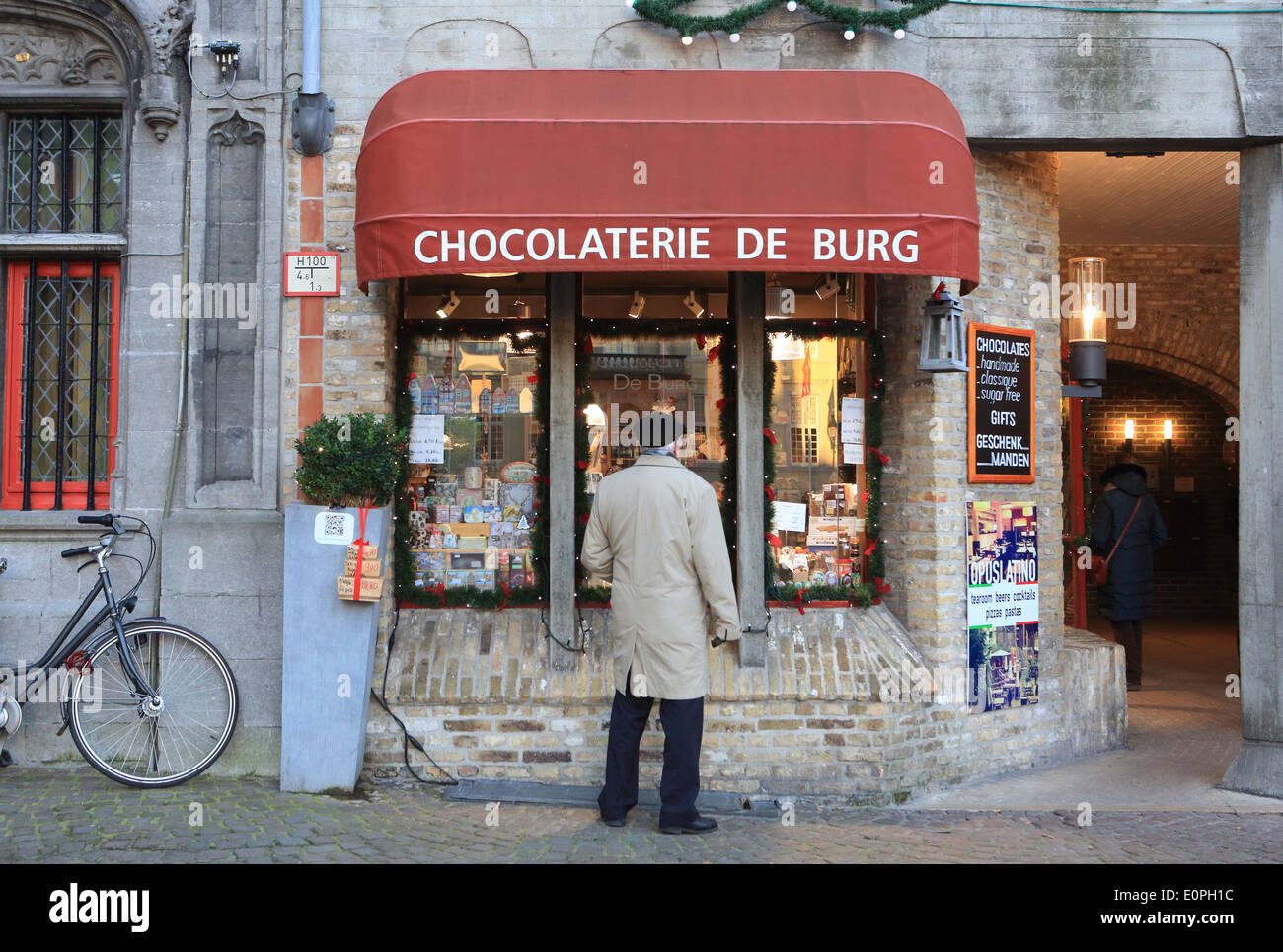 Window shopping in a chocolate shop, on the Burg, in Bruges/Brugge, at ...