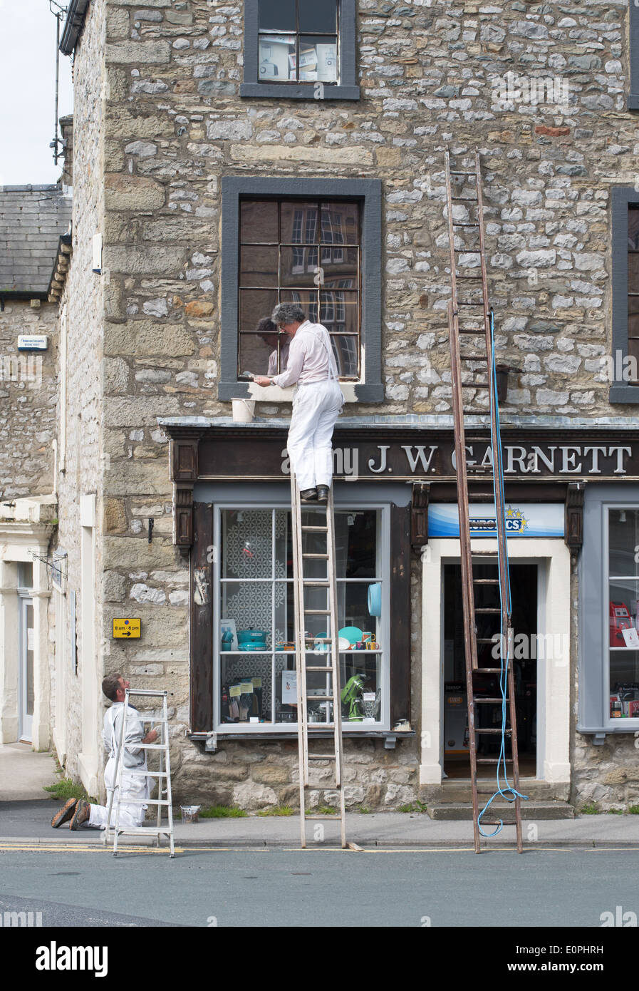 Man working up ladder using hi-res stock photography and images - Alamy
