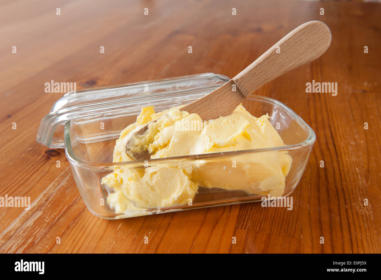 Home made butter in glass butter dish Stock Photo - Alamy