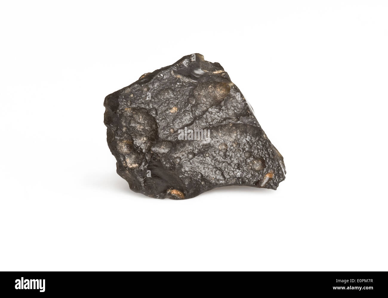 Tektite rough specimen on white background Stock Photo - Alamy
