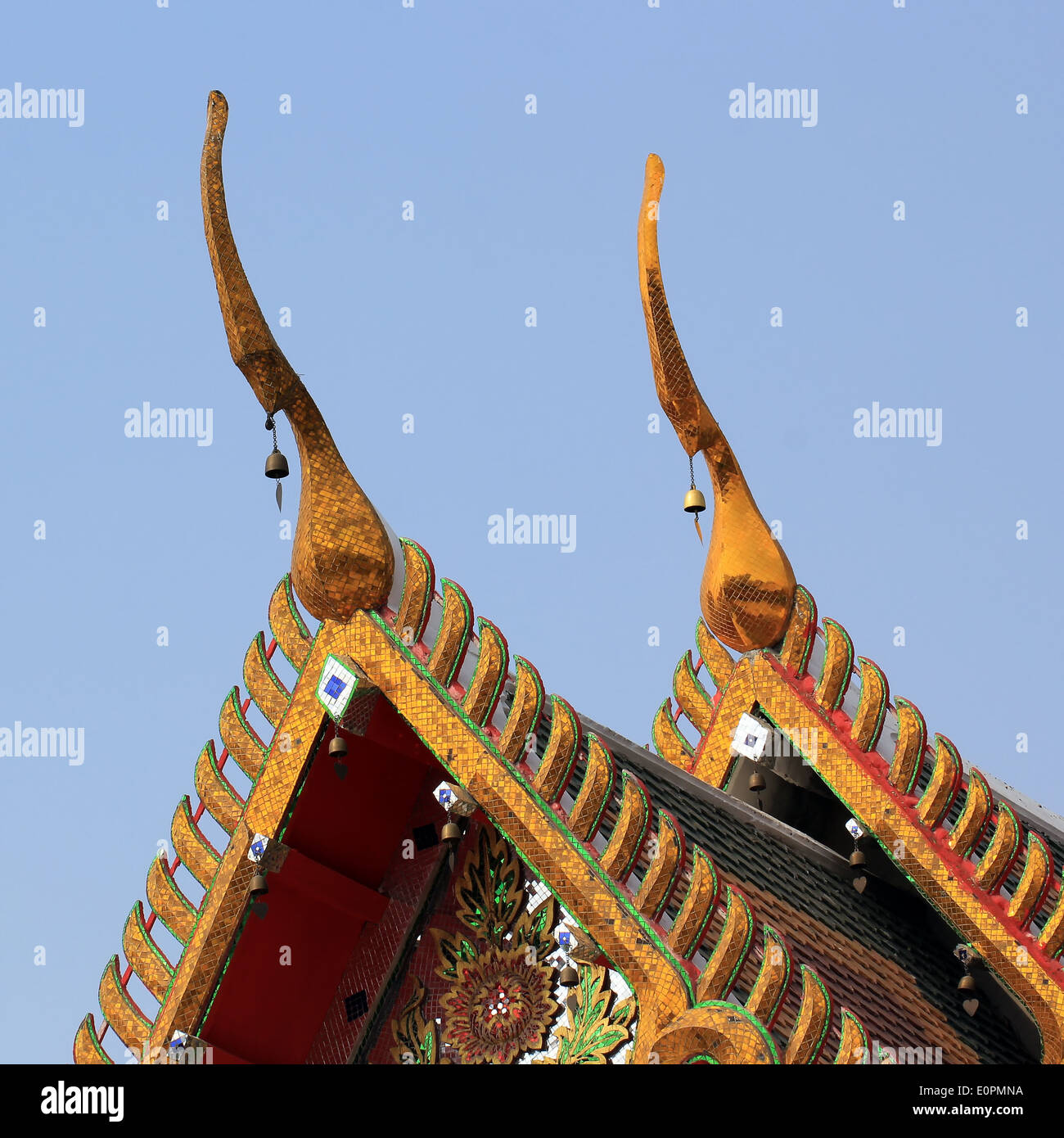 gable apex on temple roof with blue sky background Stock Photo - Alamy