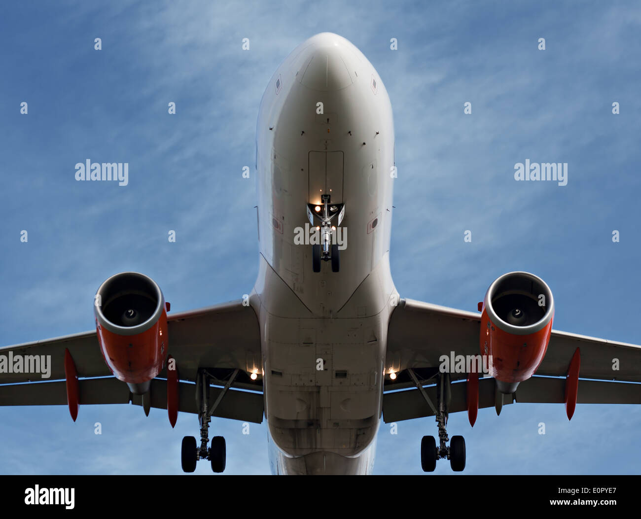 Close up of passenger plane landing overhead Stock Photo - Alamy
