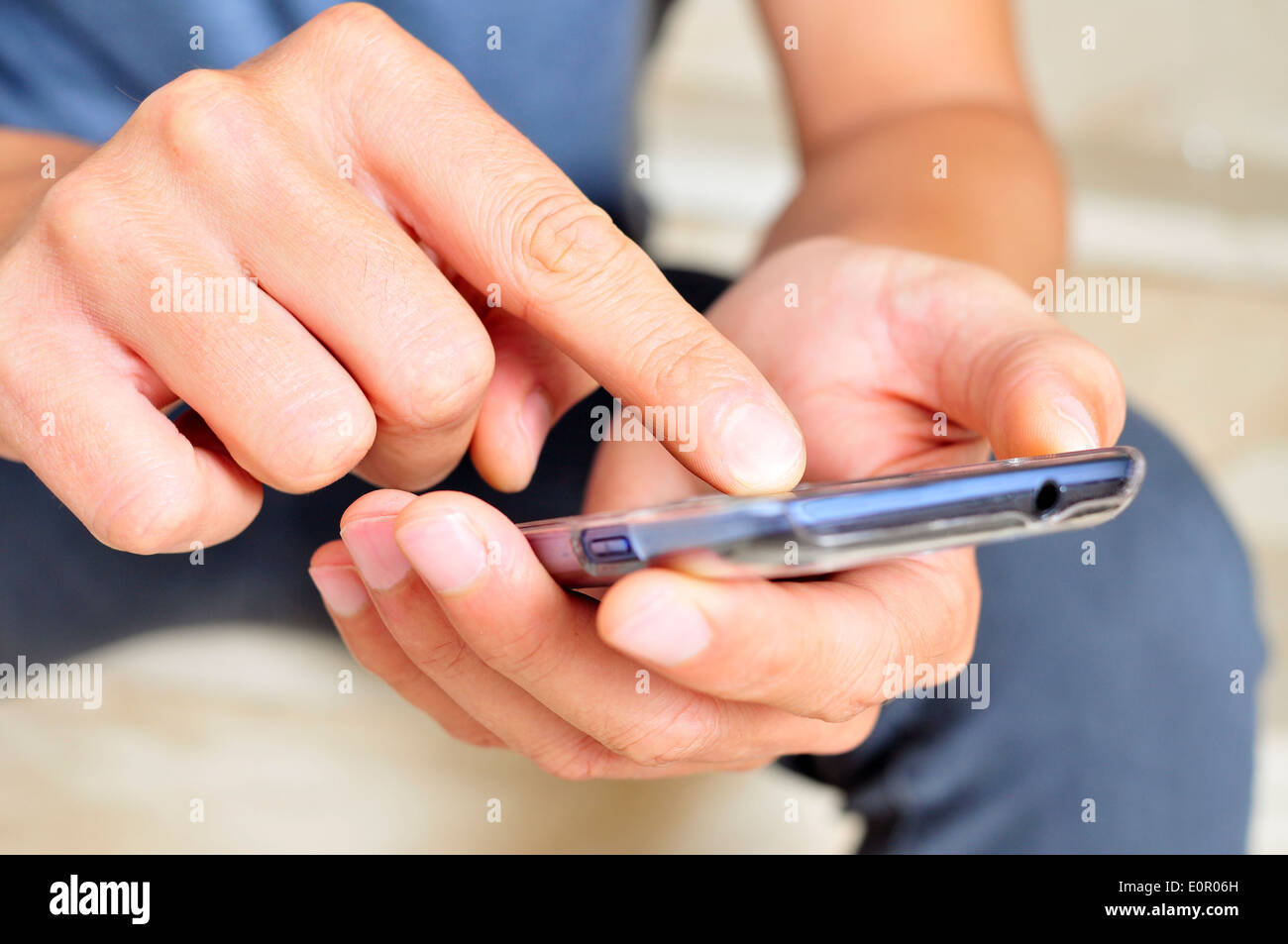 Searching information using smartphone hi-res stock photography and ...